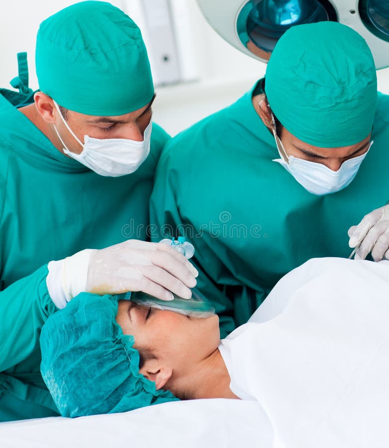 Surgeons Near Patient Lying on Operating Table Stock Image - Image of ...