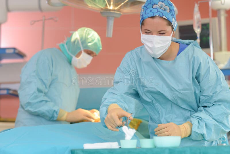 Surgeons Operate on Patient Stock Photo - Image of operating, male ...