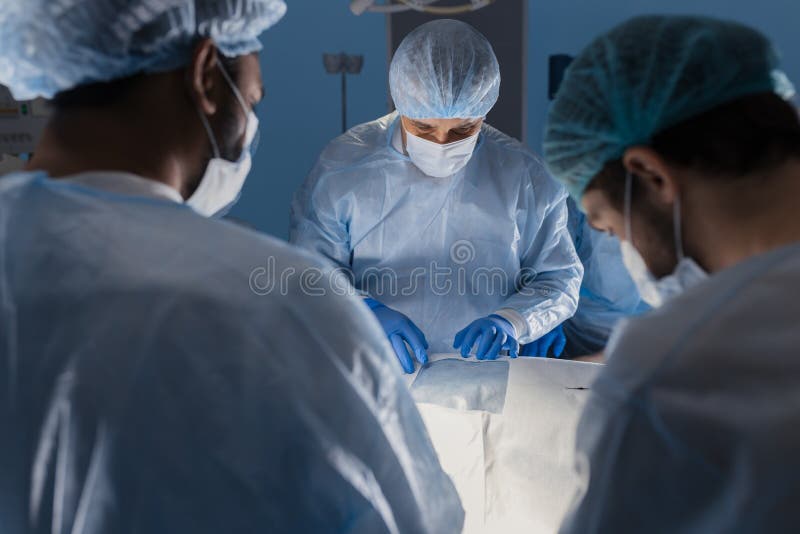 Surgeons Perform a Complex Operation To Save a Human Life at Hospital ...