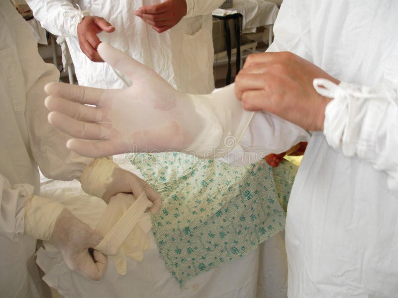 Surgeons at operation stock photo. Image of green, instruments - 2241548