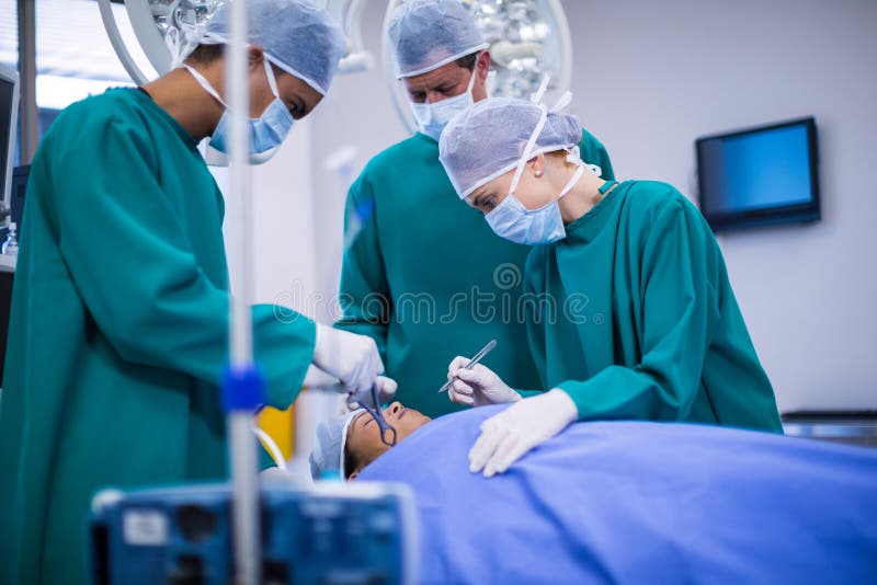 Surgeons Performing Operation in Operation Theater Stock Photo - Image ...