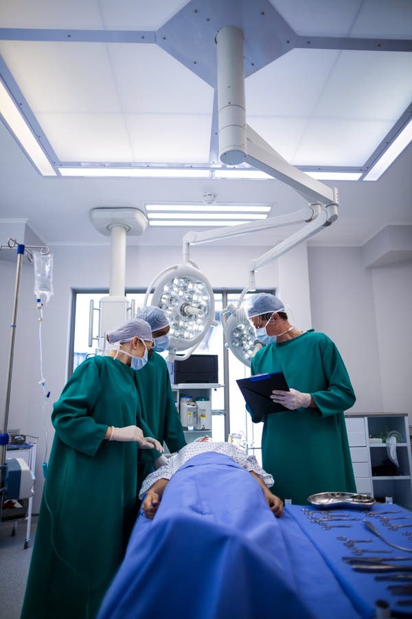 Surgeons Performing Operation in Operation Theater Stock Photo - Image ...
