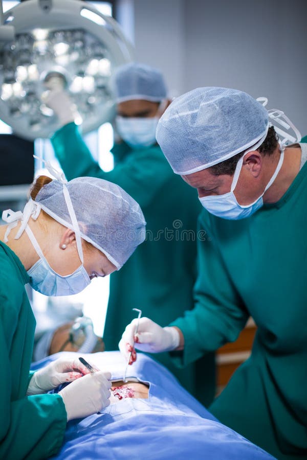 Surgeons Performing Operation in Operation Theater Stock Photo - Image ...