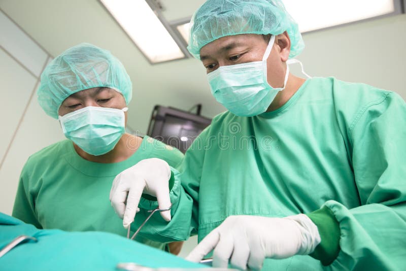 Surgeons during a Surgery in the Hospital Stock Photo - Image of ...