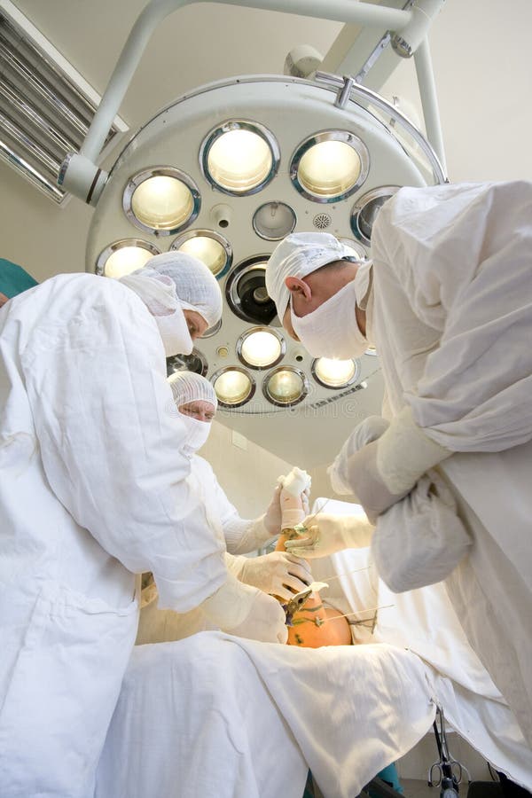 Surgeons at work stock photo. Image of correction, hand - 4590800