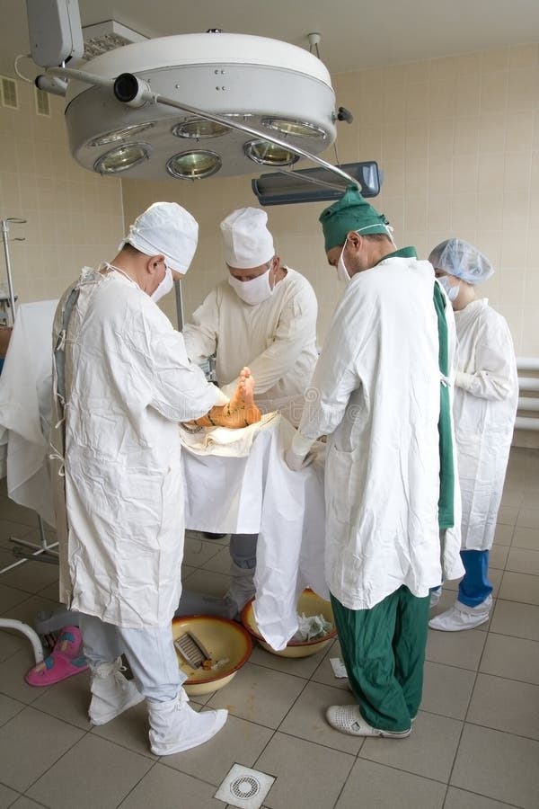 Surgeons at work stock image. Image of body, correction - 4591155