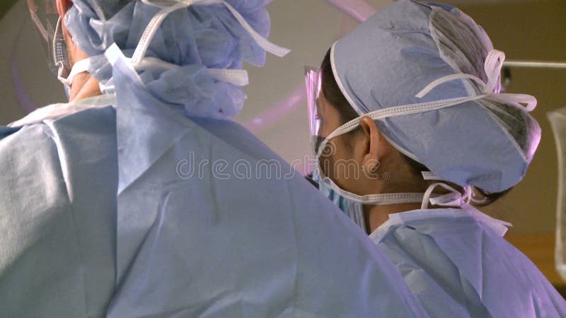 Surgeons Watch Monitor while Performing Laparoscopic Surgery (4 of 18 ...