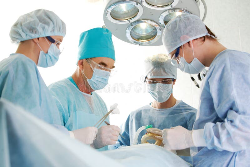 Surgeons at work stock photo. Image of assistant, clinic - 15104424