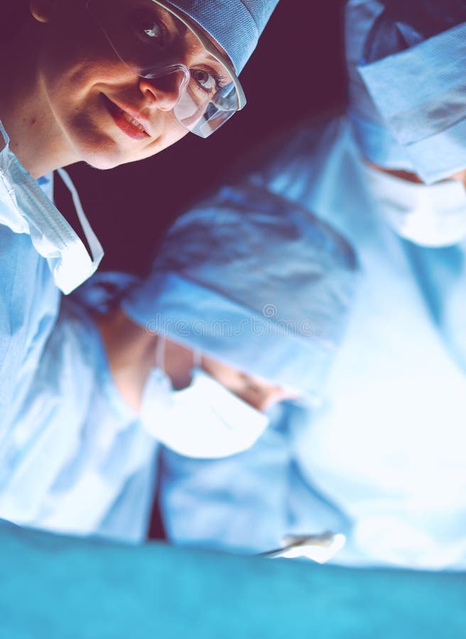 Female Surgery in the Operating Room Stock Image - Image of operating ...