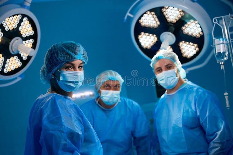 Surgical Doctors Team Performing Operation in Operating Room Stock ...