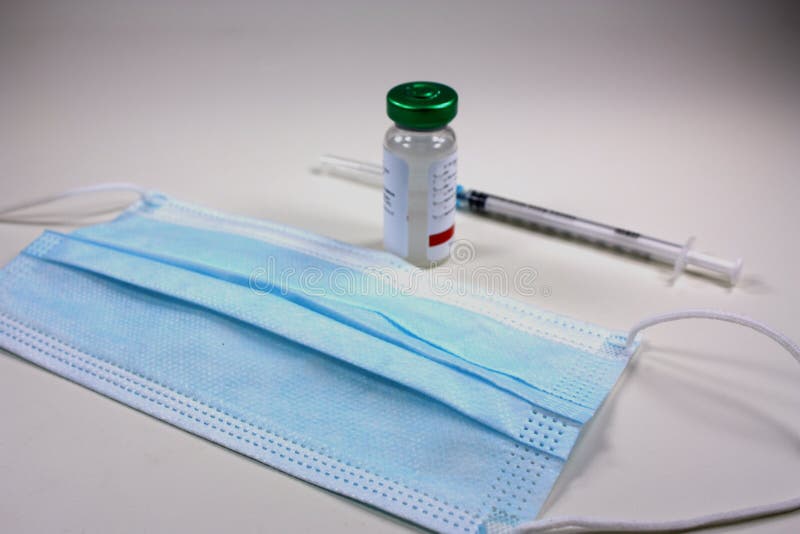 Surgical Face Mask, a Small Jar and a Syringe Stock Image - Image of ...