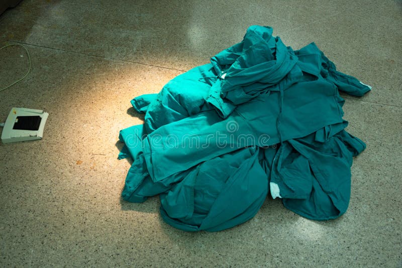 Surgical Gowns on the Floor in Operating Room Stock Photo - Image of ...