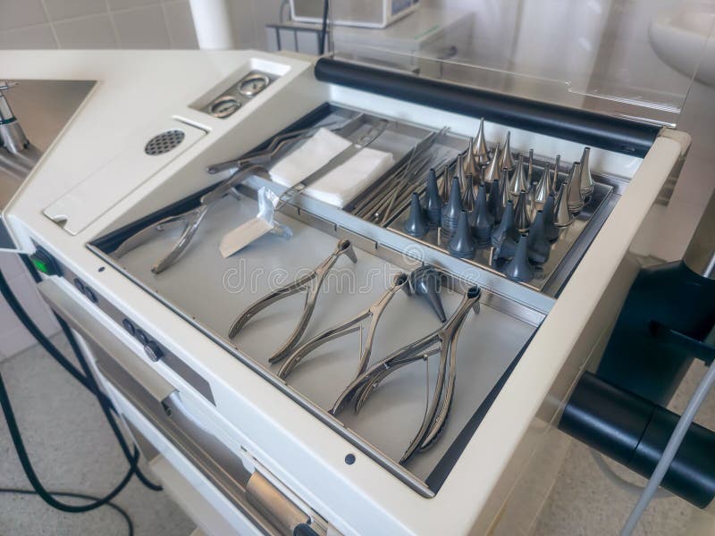 A Medical Tray Containing Various Syringes, Vials, and a Surgical ...
