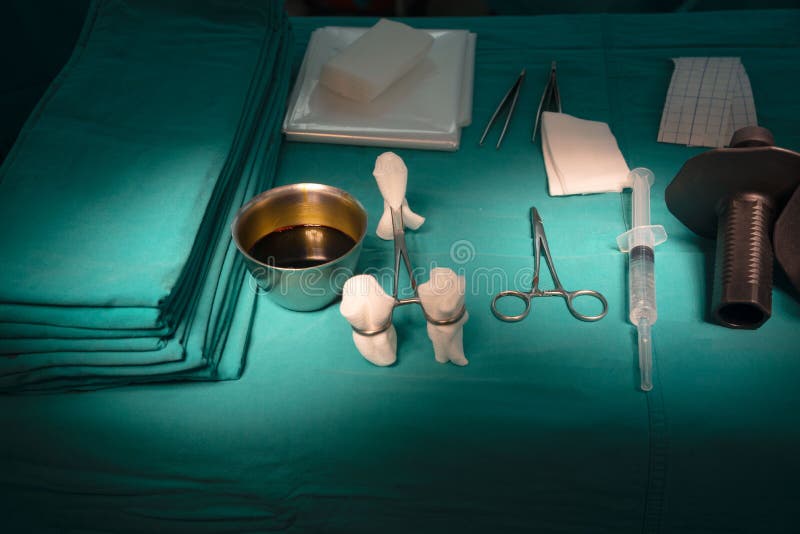 Surgical Instruments on Green Table Stock Image - Image of background ...