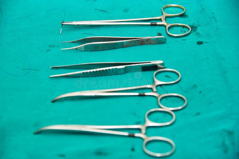 Surgical Instrument Using in Operation on Green Table Stock Photo ...