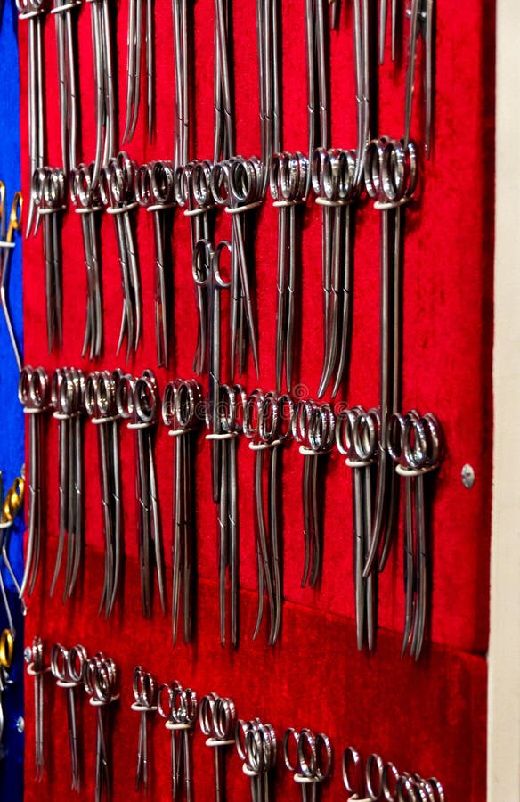 Surgical Instruments, Medical Scissors and Various Types of Clamps Hang ...