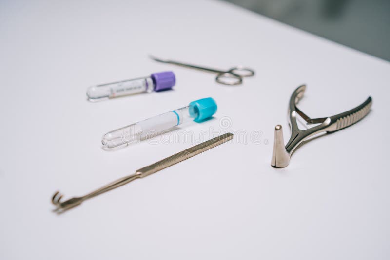 Surgical Instruments and Several Test Tubes Lie on the Table Stock ...
