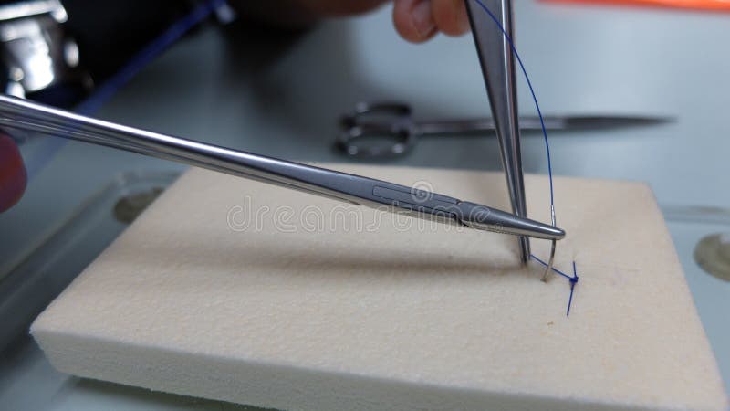 Surgical Instruments Used during Operation. Needle, Holder and Suture ...