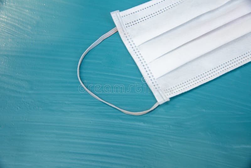 Surgical Mask on Blue Background Stock Image - Image of face, dust ...
