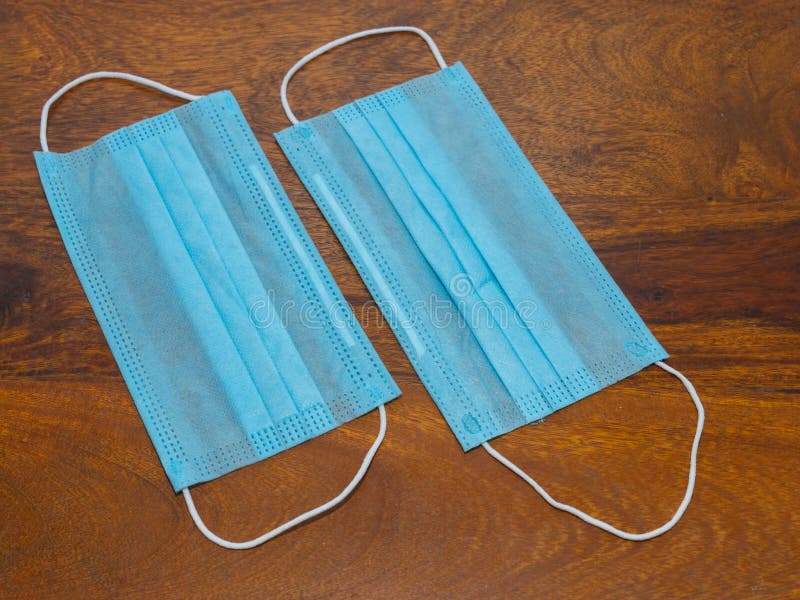 Surgical Masks Kept Side by Side on a Table with Copy Space Stock Photo ...