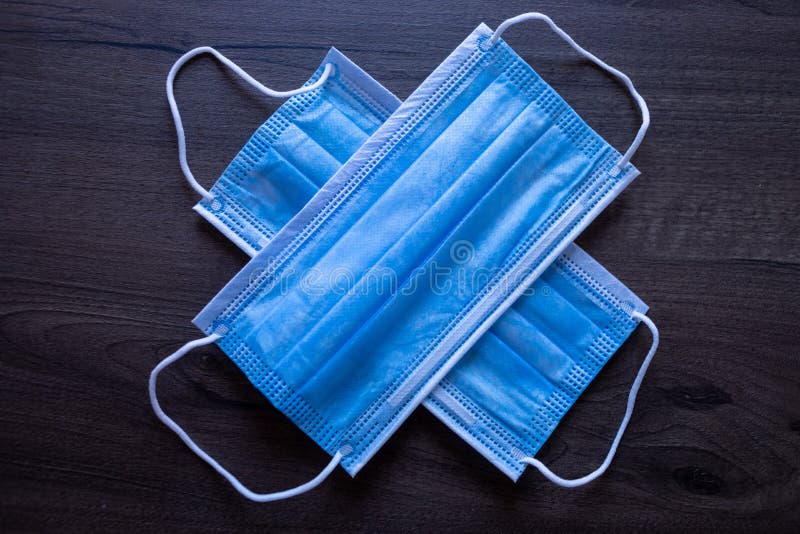 Surgical Medical Face Mask on Table Stock Image - Image of protective ...