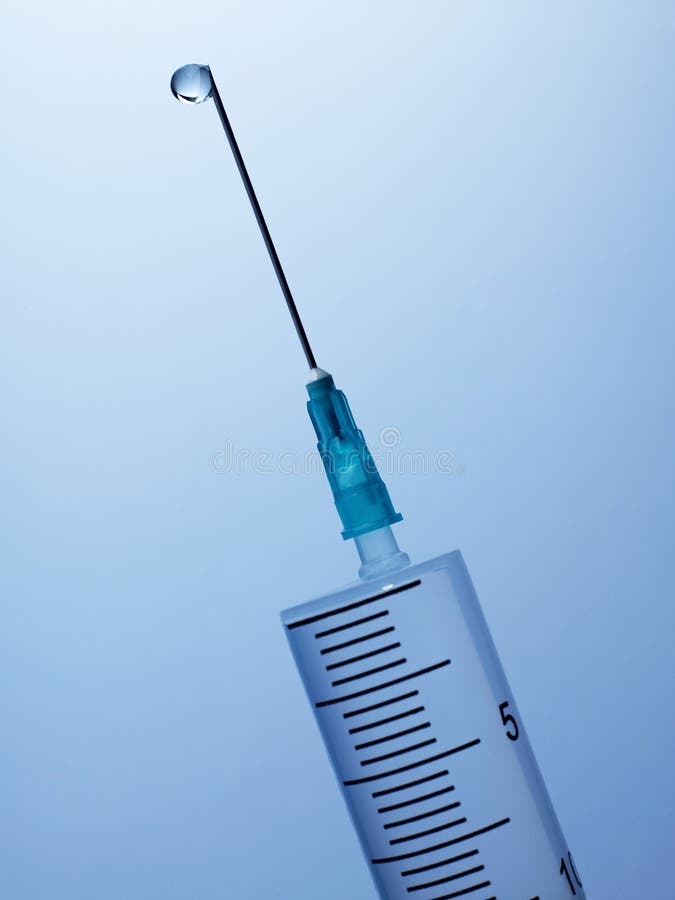 Surgical needle on blue stock photo. Image of medical - 113661478
