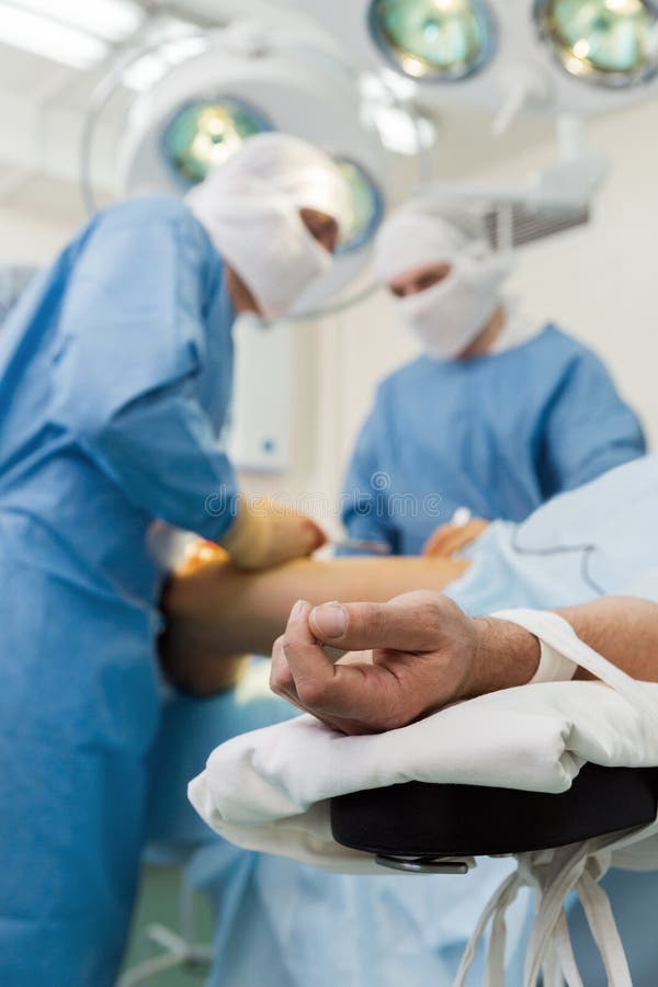 A surgical operation. stock photo. Image of operation - 75607702