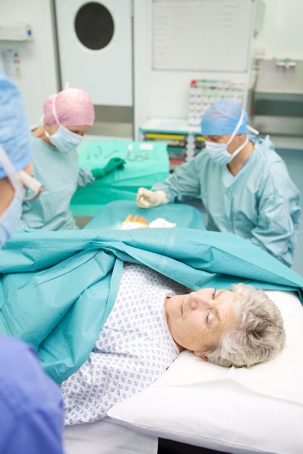 Surgical Team Performing Operation Stock Image - Image of doctor ...