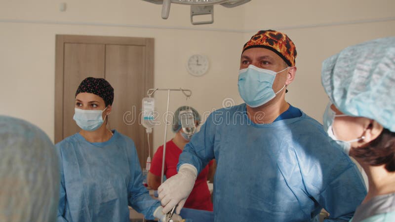 Surgical Team Working in Operating Theatre. during the Operation in the ...