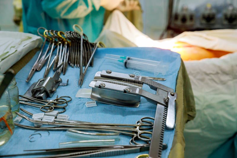 Surgical Tools Lying on Table of Surgeons at Work Operating in Surgical ...