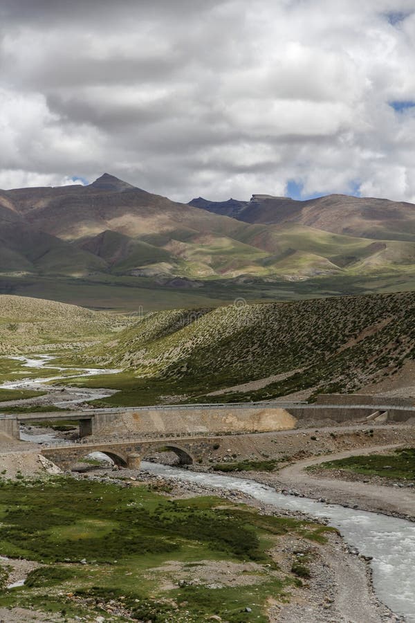 A Surging River Under the Bridge Stock Photo - Image of autumn ...