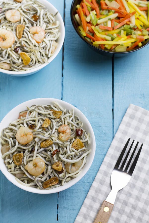 Surimi Elvers with Prawns and Garlic Stock Photo - Image of seafood ...
