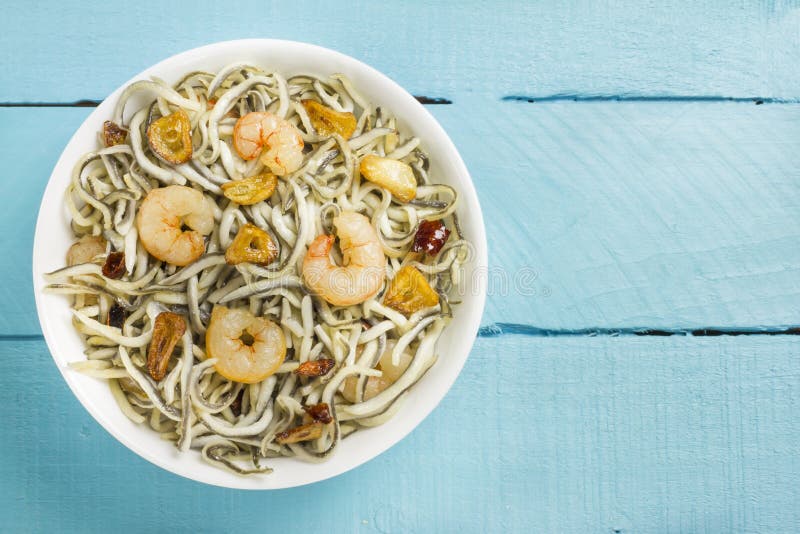 Surimi Elvers with Prawns, Garlic, and Pepper Stock Image - Image of ...