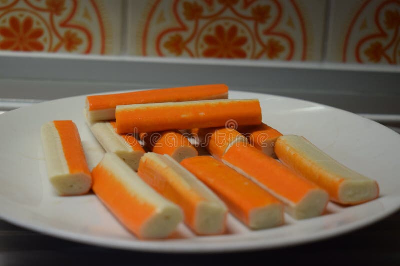 Surimi sticks on a plate stock photo. Image of salad - 316119926