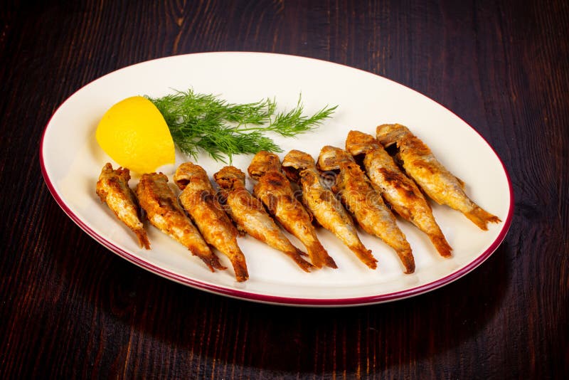 Surmullet fish with lemon stock photo. Image of gourmet - 122272064
