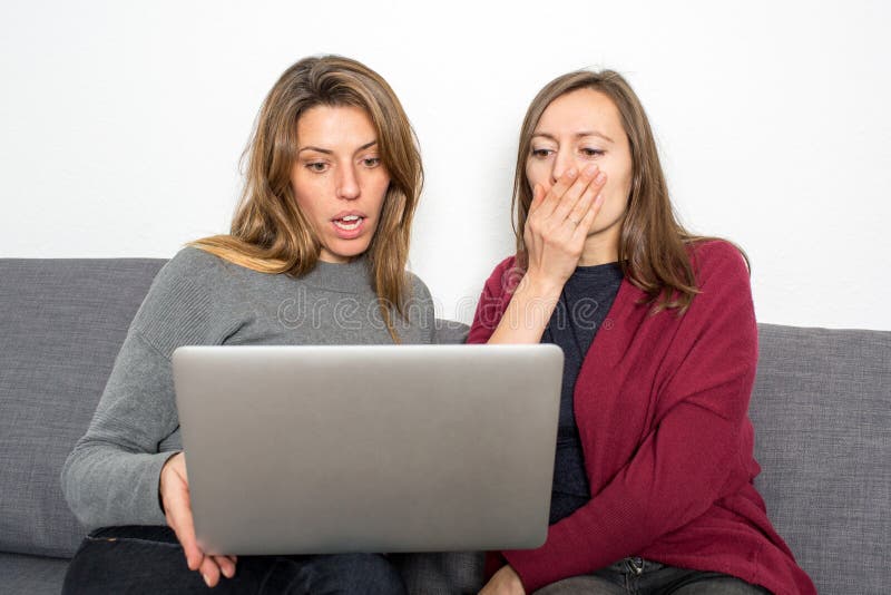 Surprise while Looking on Computer Stock Image - Image of sisters ...