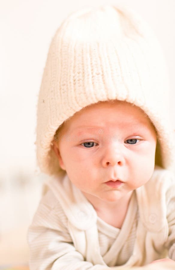 Surprised baby stock image. Image of mouth, covered, home - 13742395