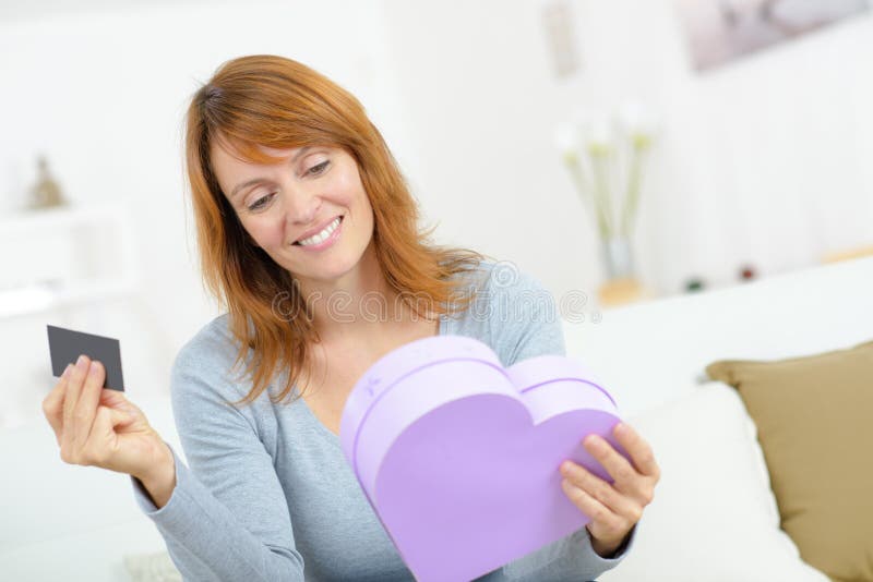 Surprised Beautiful Woman Holding Heart Shape Gift Stock Photo - Image ...