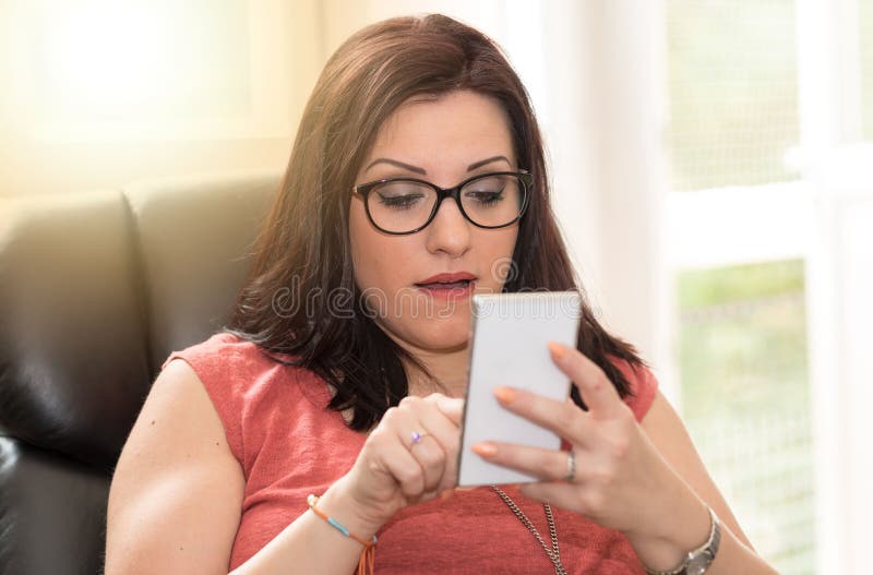 Surprised Beautiful Young Woman Watching Her Mobile Phone, Light Effect ...