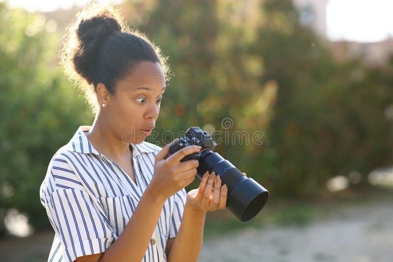 Surprised Black Photograper Checking Result on Camera Stock Image ...