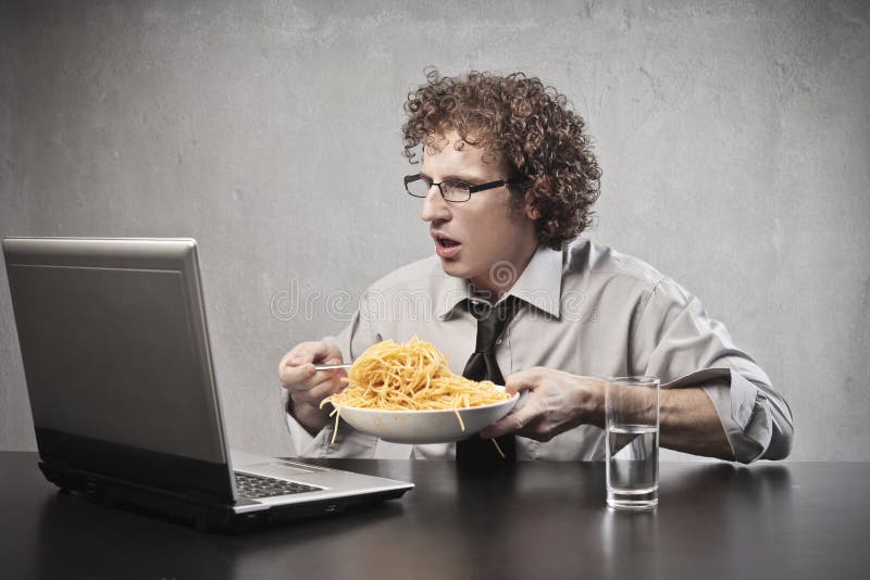 Man Eating Spaghetti Using Computer Stock Photos - Free & Royalty-Free ...