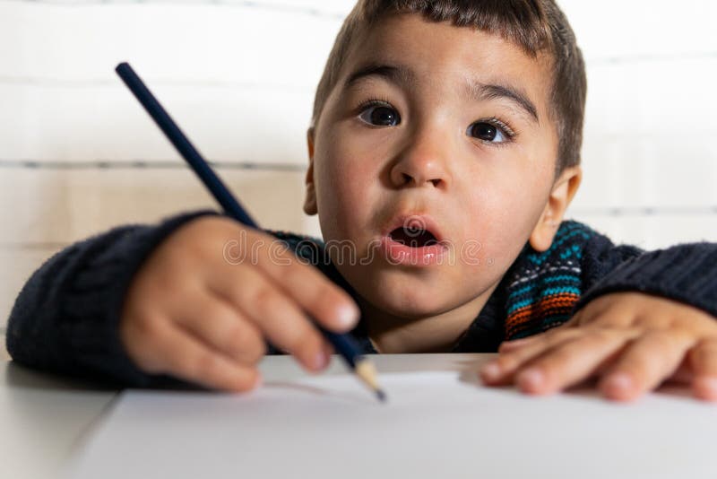 Surprised Child while Drawing. Stock Image - Image of house, pencil ...