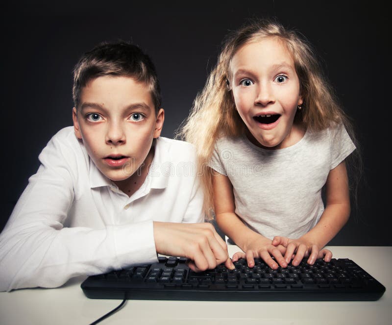 Surprised Child Looking at a Computer Stock Photo - Image of gambling ...
