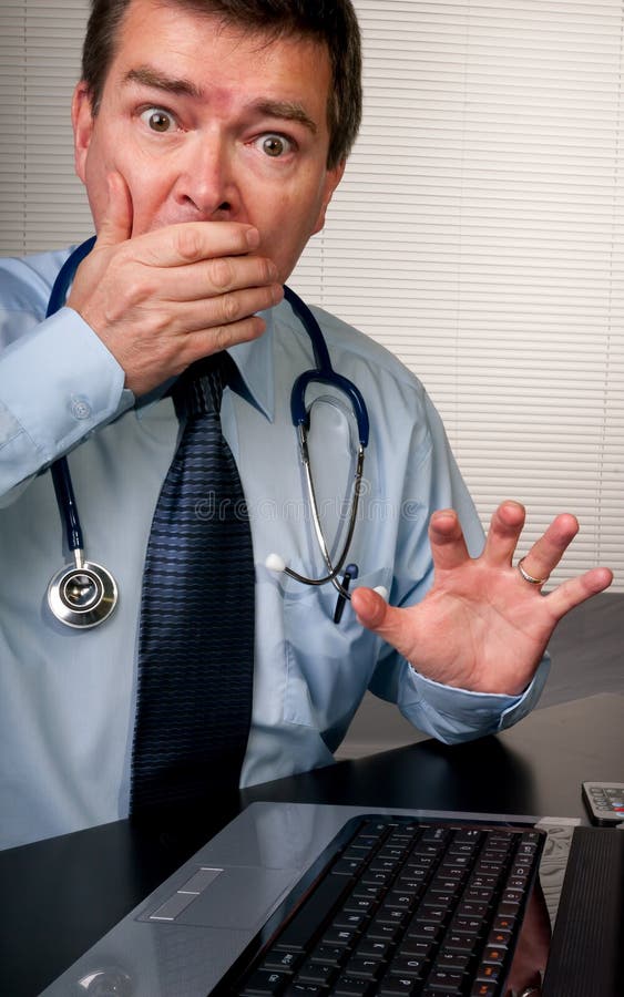 Surprised Doctor Reacts To Patient Stock Photo - Image of indoors ...