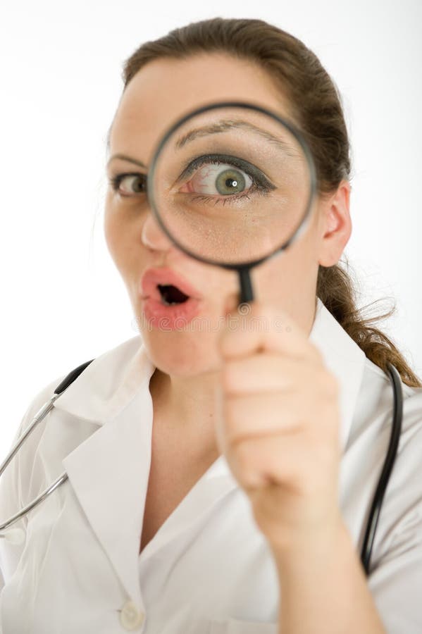 Surprised Female Doctor with Magnifying Glass Stock Image - Image of ...