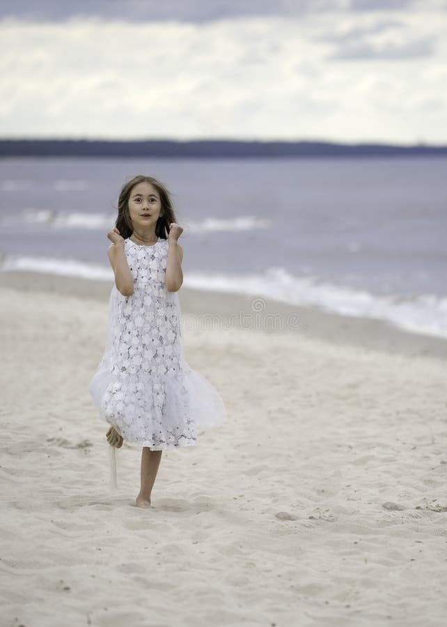 Surprised Girl is Running on the Beach Stock Image - Image of scared ...