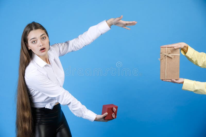 Surprised Girl with Tiny Box Displaying Invisible Size, while Crop Male ...