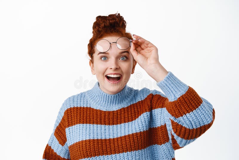 Surprised And Happy Redhead Girl Take Off Glasses And Stare At Camera