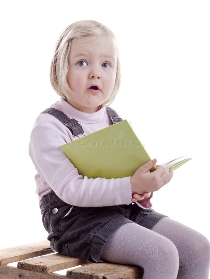 Surprised Little Girl Reading a Book Stock Image - Image of reading ...