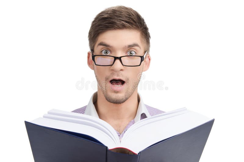 Surprised man with a book stock photo. Image of attractive - 31958972